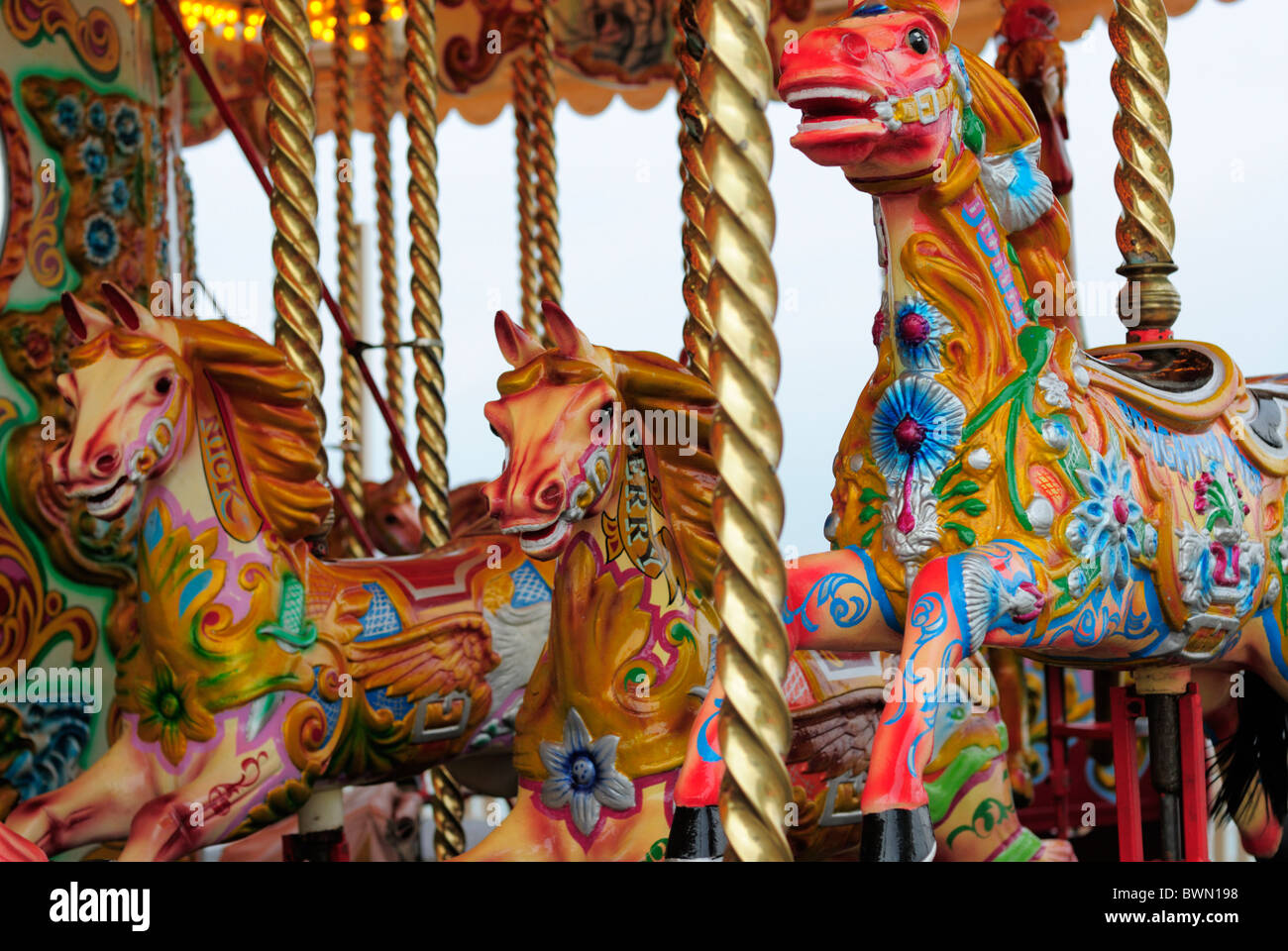 Horses on a fairground carousel Stock Photo - Alamy