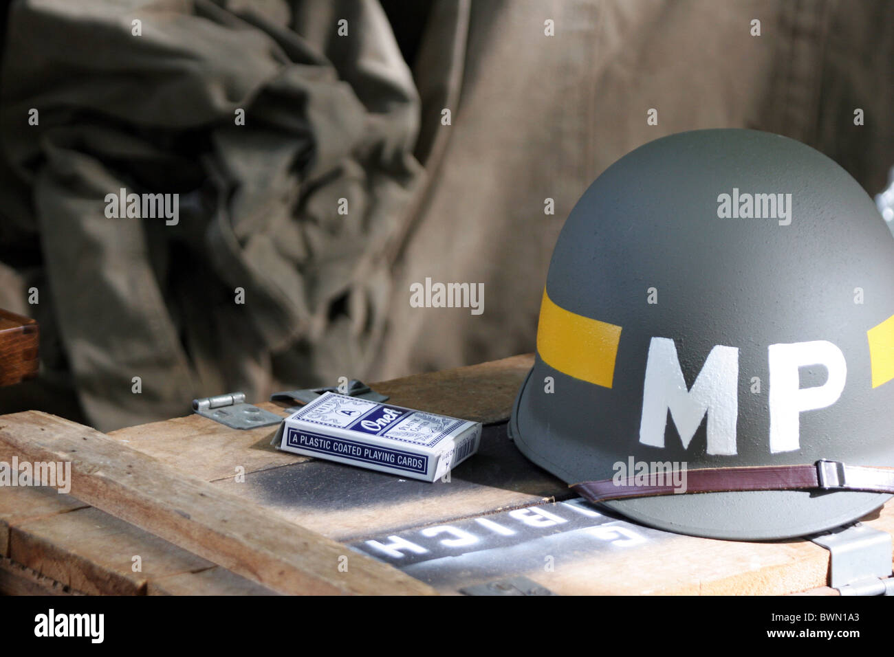A World War II WWII MP helmet in the tent camp Military police ...