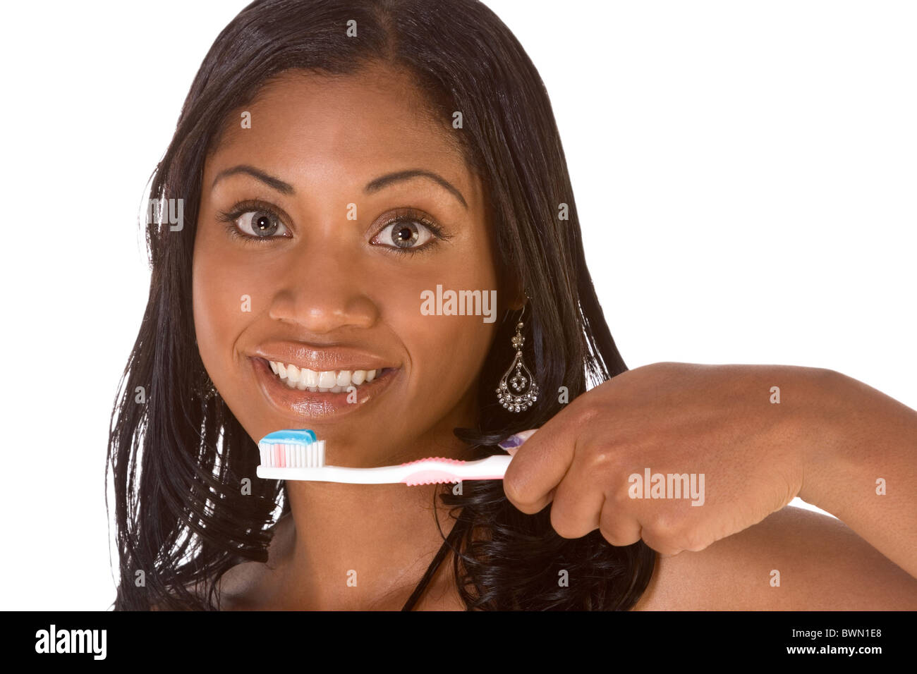 Portrait of Afro-American female holding toothbrush with blue ...