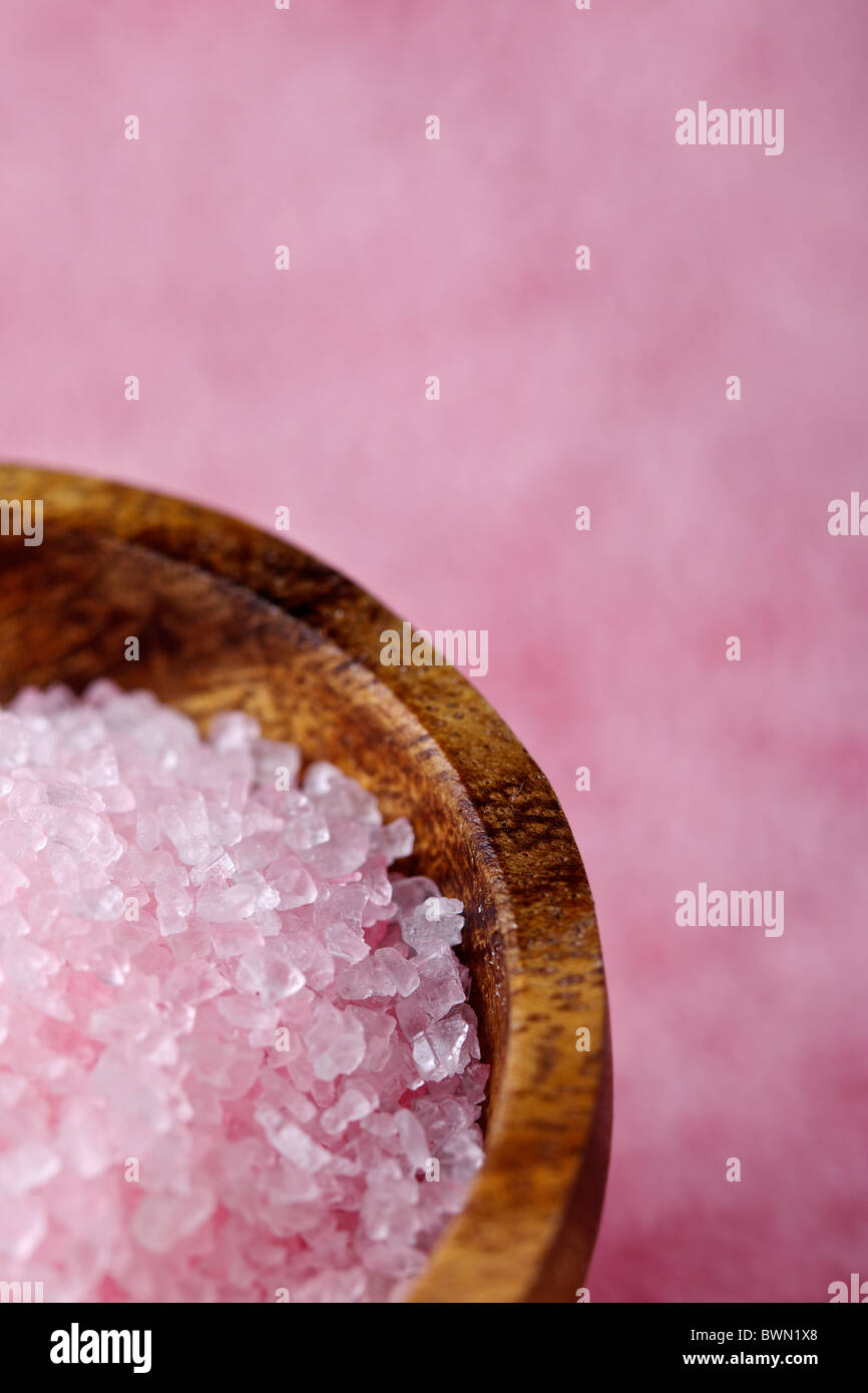 Relaxing spa treatment with body rub and rose Stock Photo - Alamy