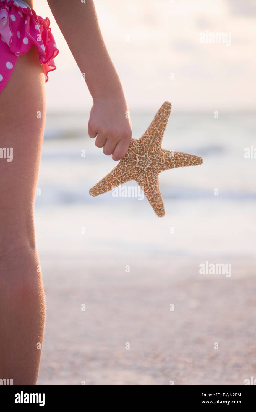 Girl Starfish High Resolution Stock Photography and Images - Alamy