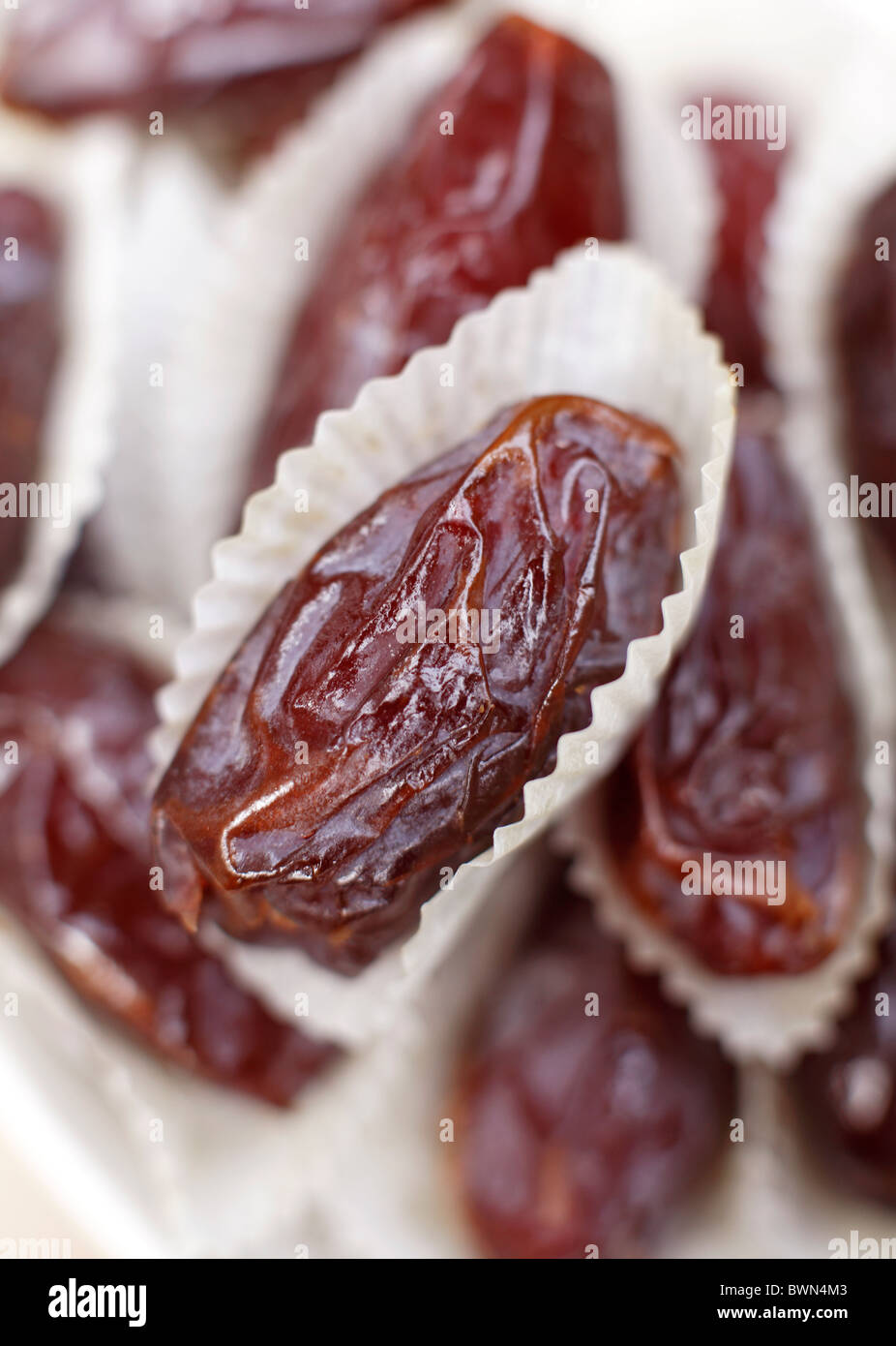 Dates in wrappers Stock Photo - Alamy