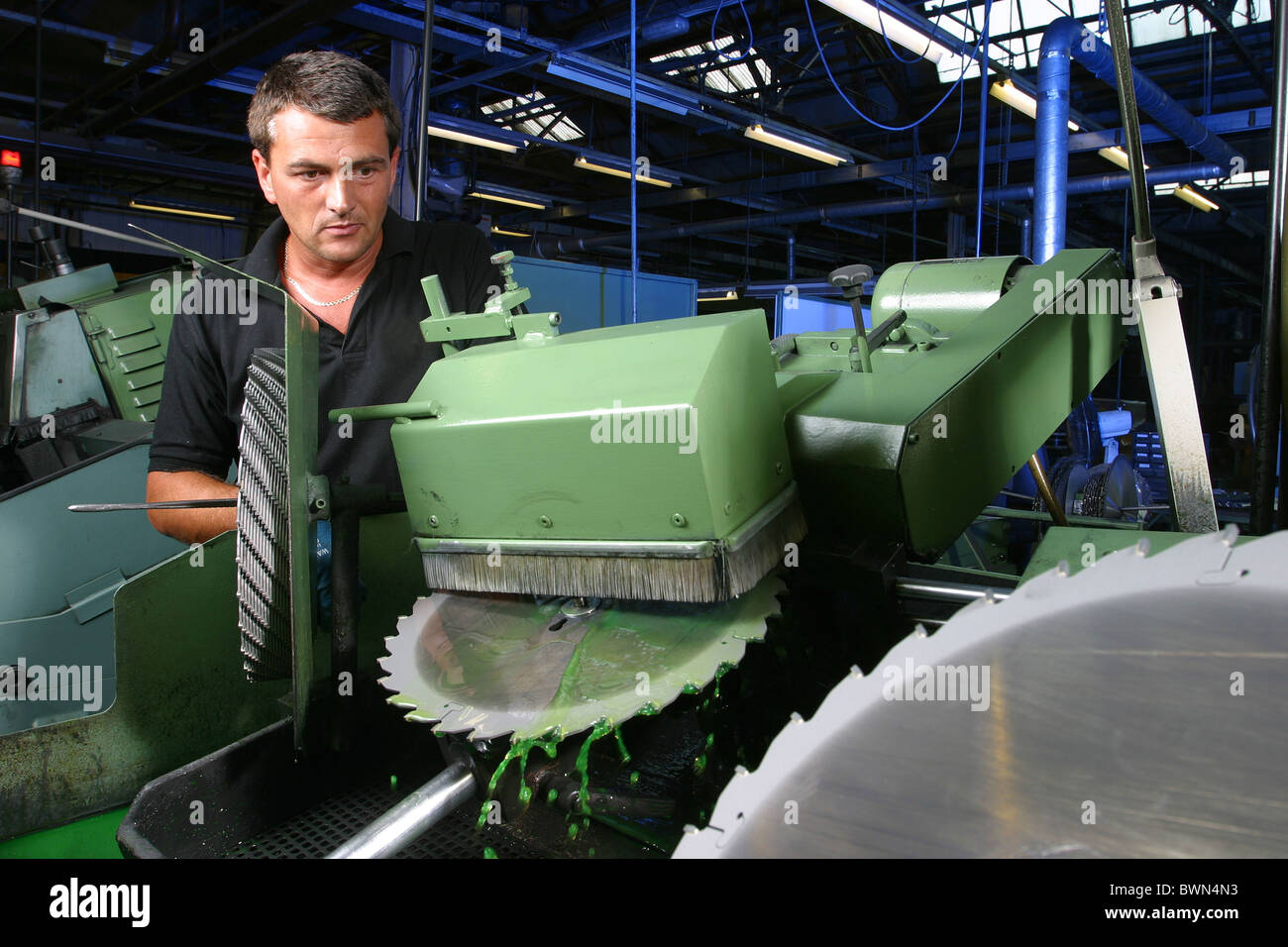 rotary saw blade factory Stock Photo - Alamy