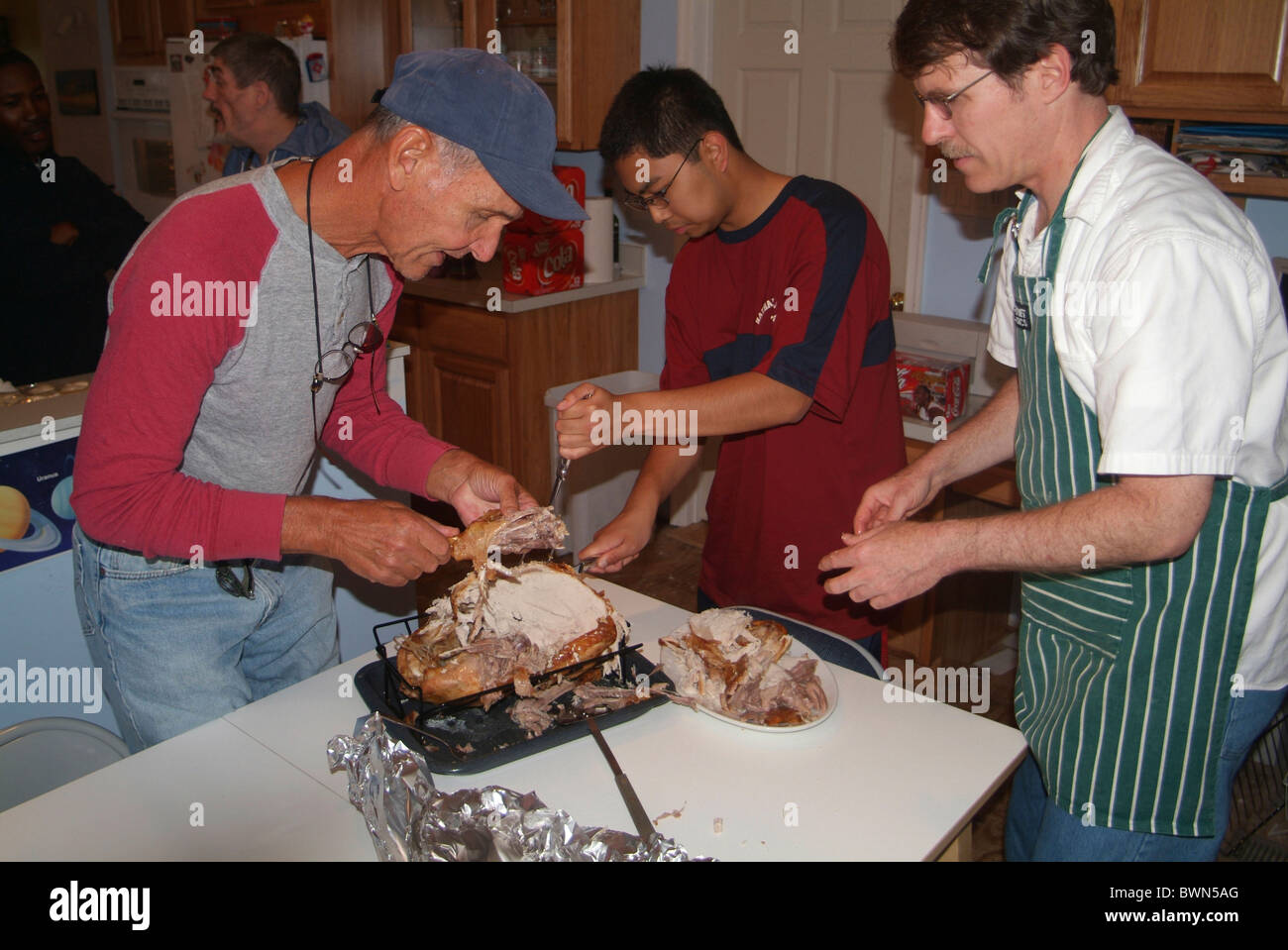 Fixing dinner hi-res stock photography and images - Alamy