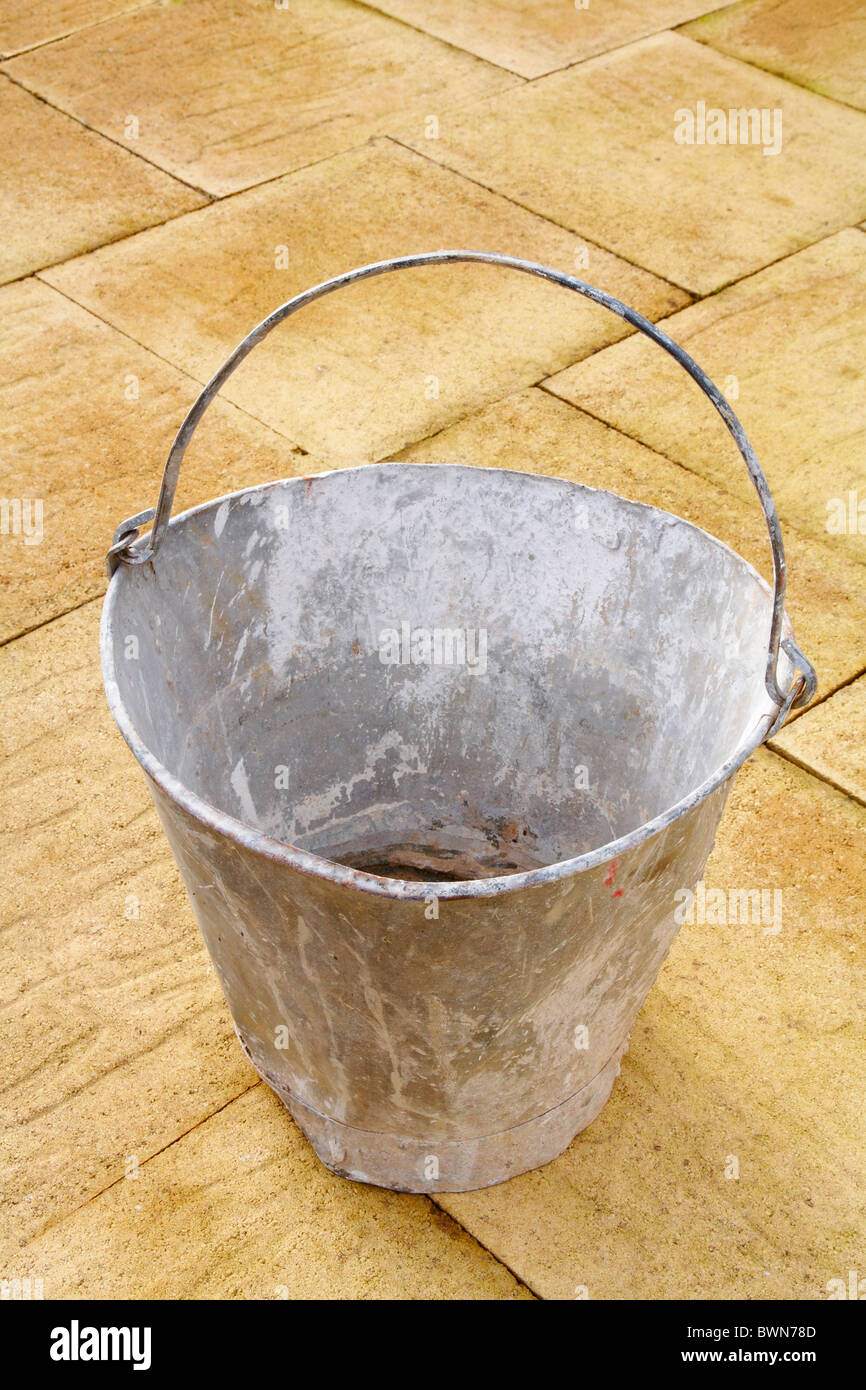 Empty Metal Builders Bucket Stock Photo - Alamy