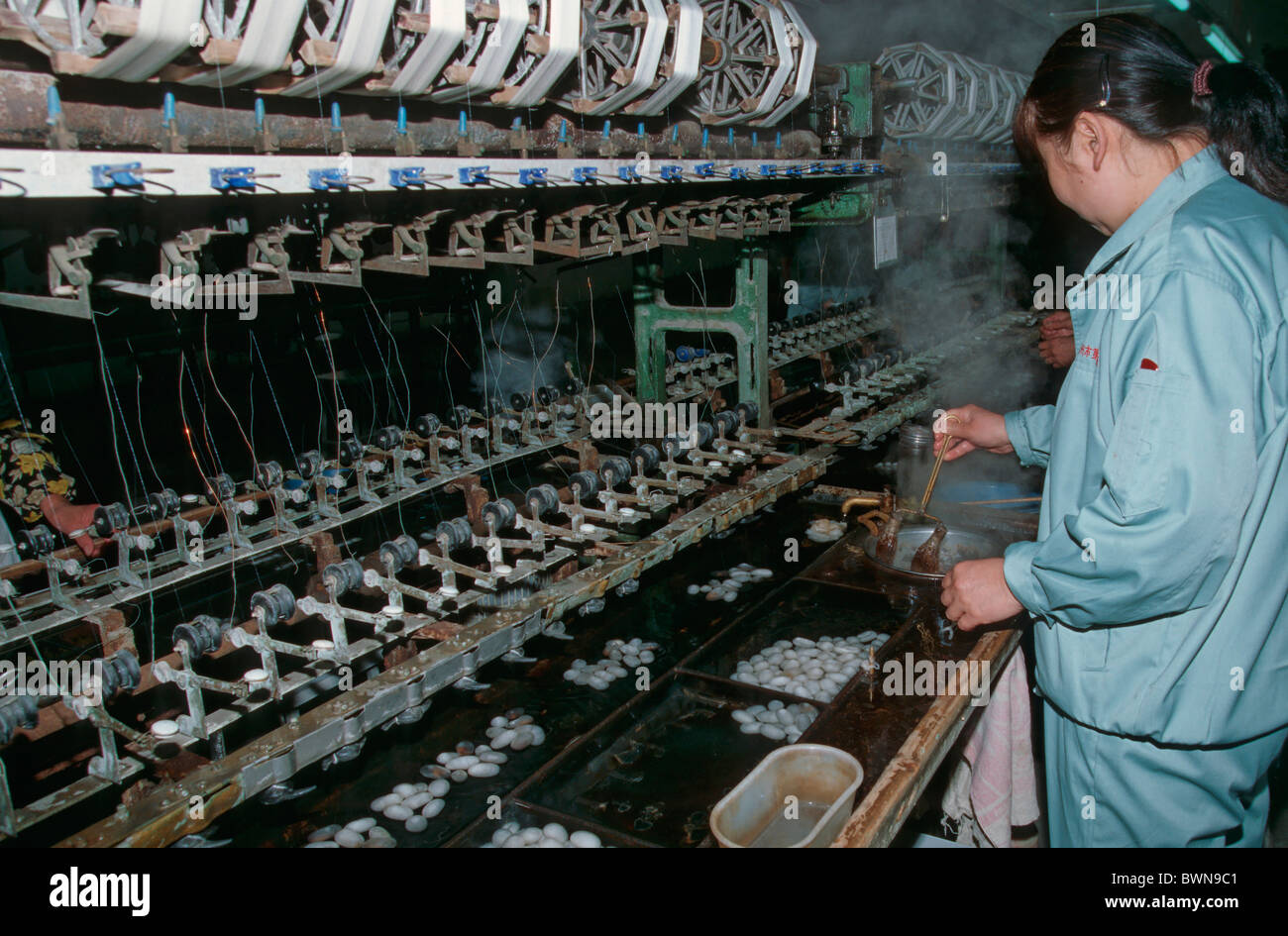 Reeling silk hi-res stock photography and images - Alamy