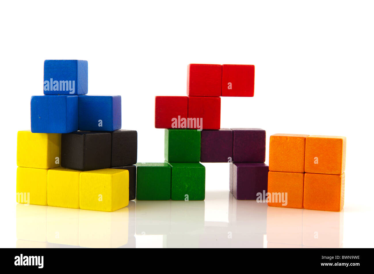 Colorful difficult puzzle in blocks isolated over white Stock Photo - Alamy