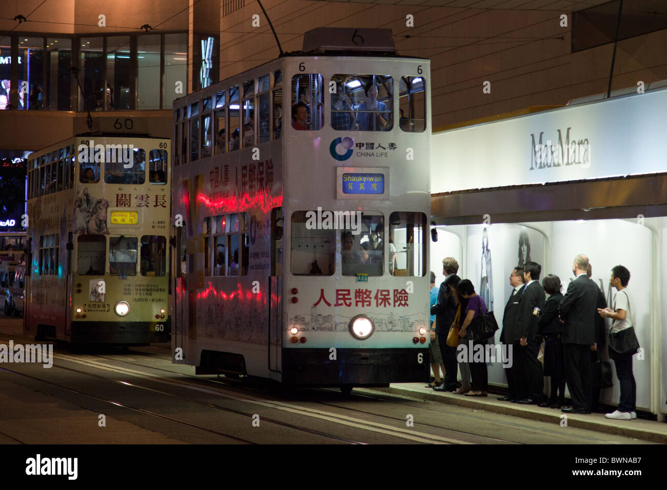 Looking at Hong Kong's tram transport system, double decker tram in The ...