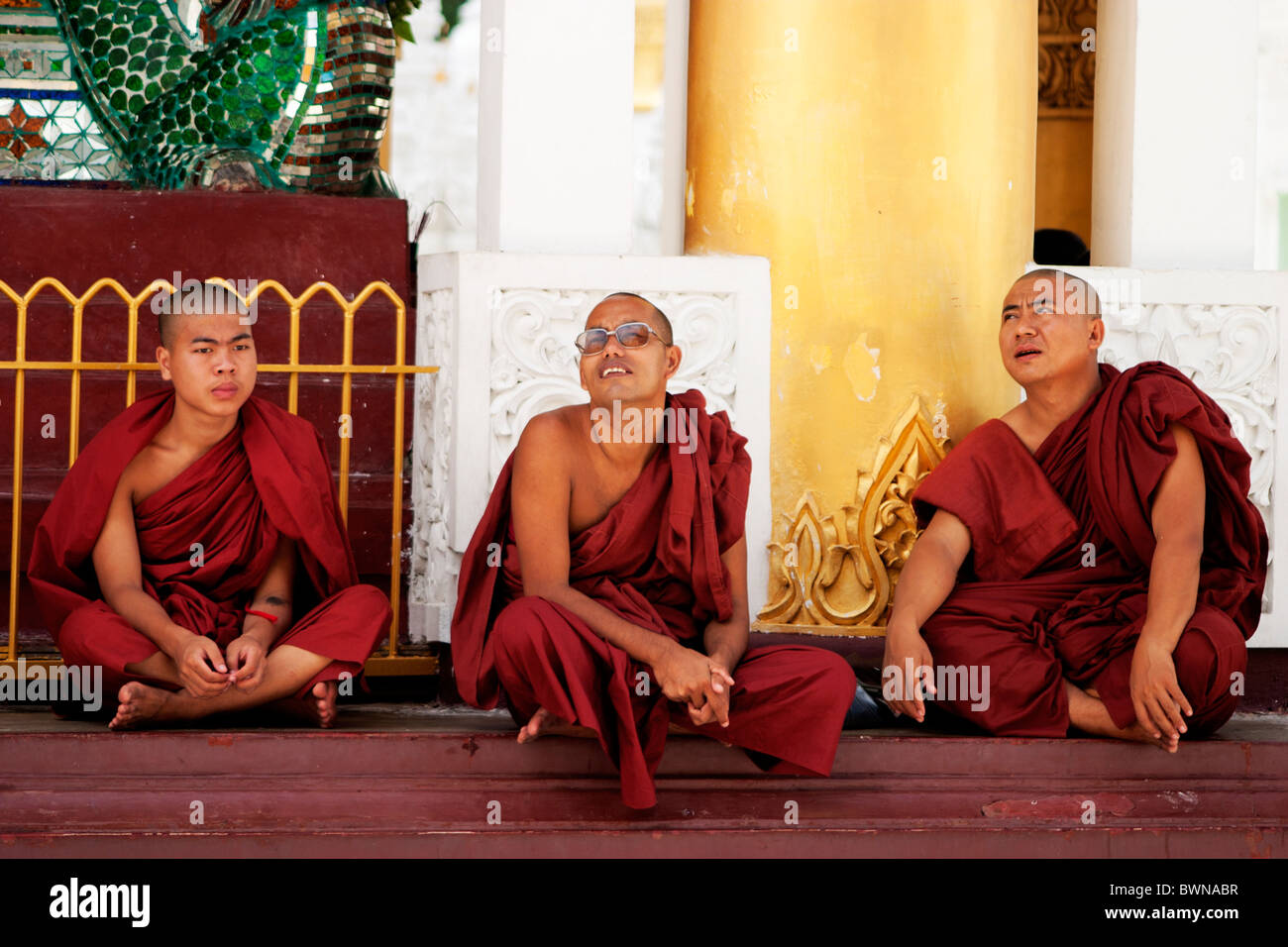 3 monks laughing Stock Photo - Alamy