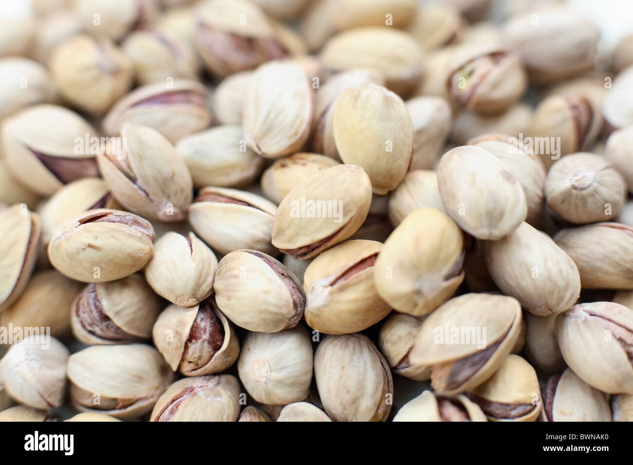 pistachio nuts roasted in their shells Stock Photo - Alamy