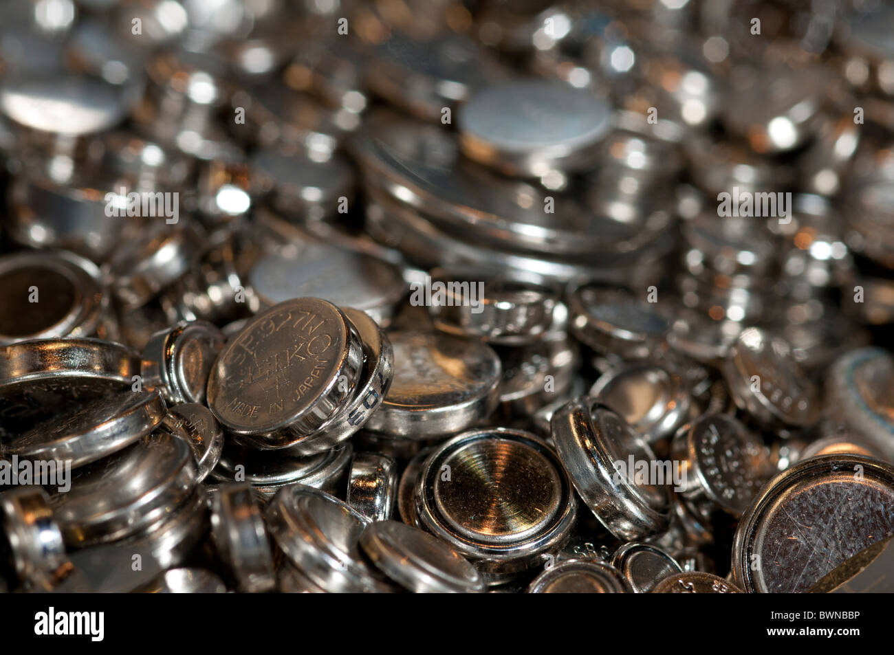 assortment of old metal watch batteries Stock Photo - Alamy