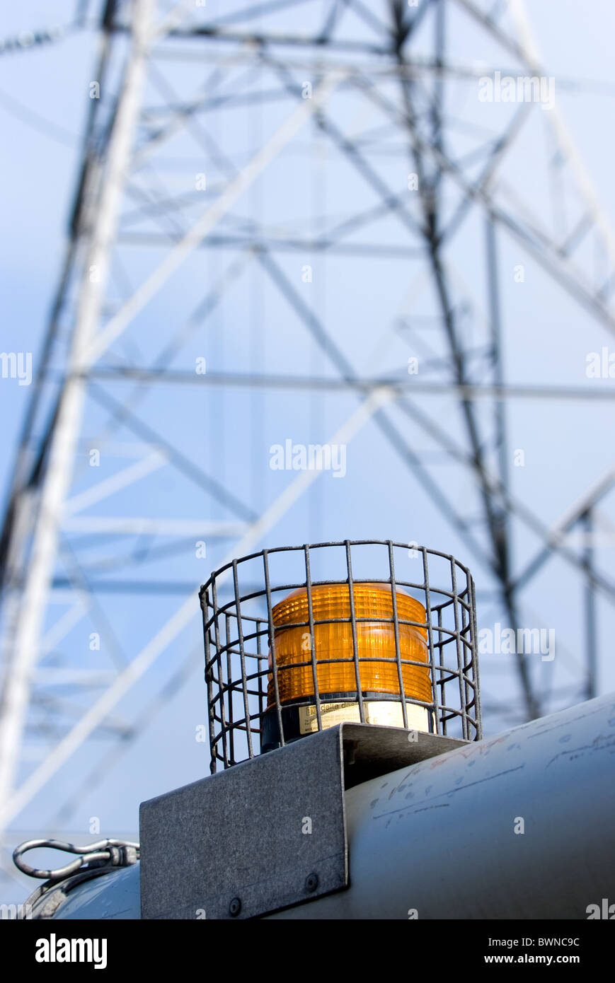 Electricity Pylon and Warning Light Stock Photo - Alamy