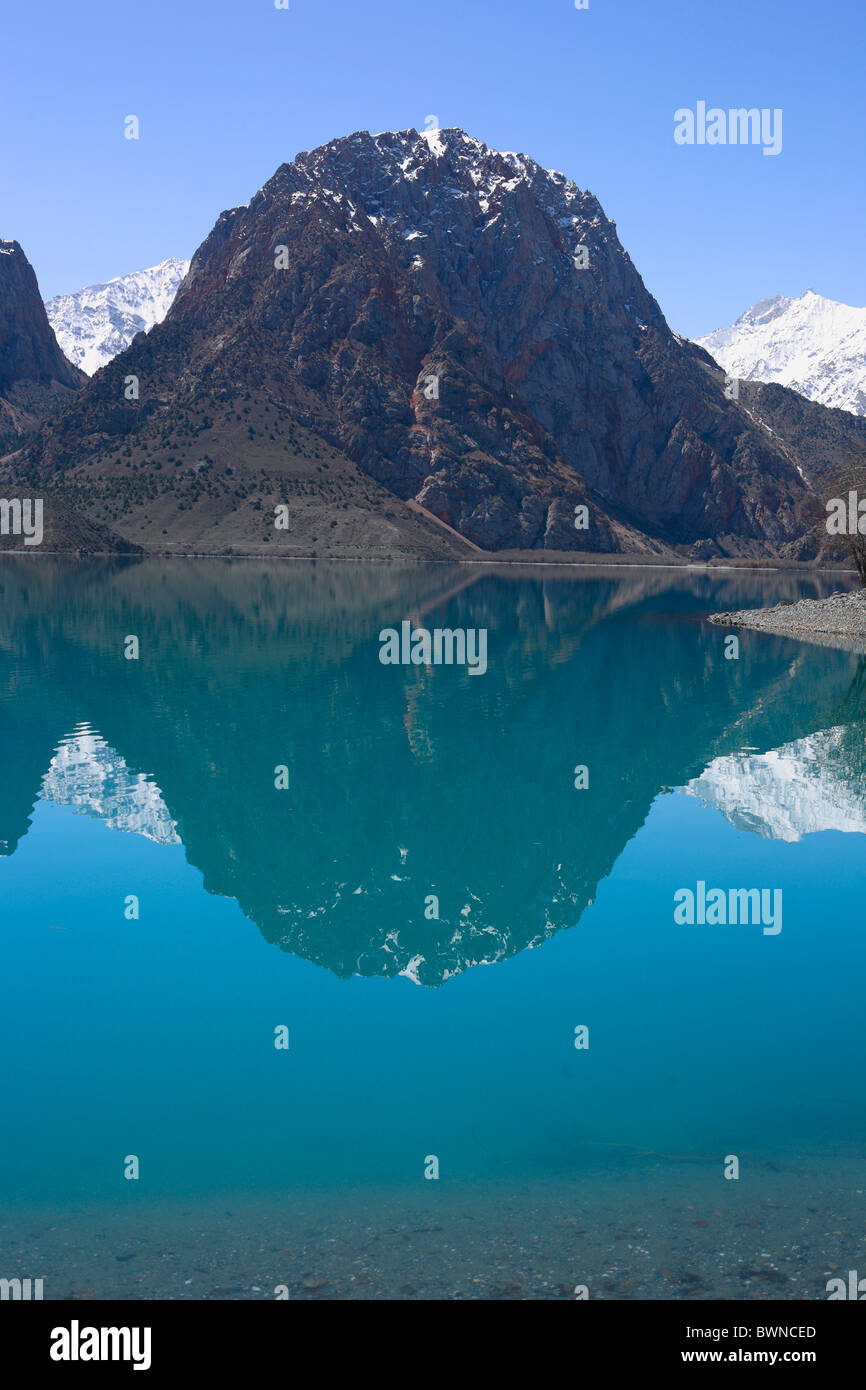 Tajikistan Central Asia blue sky Iskanderkul lake Fan mountain water ...