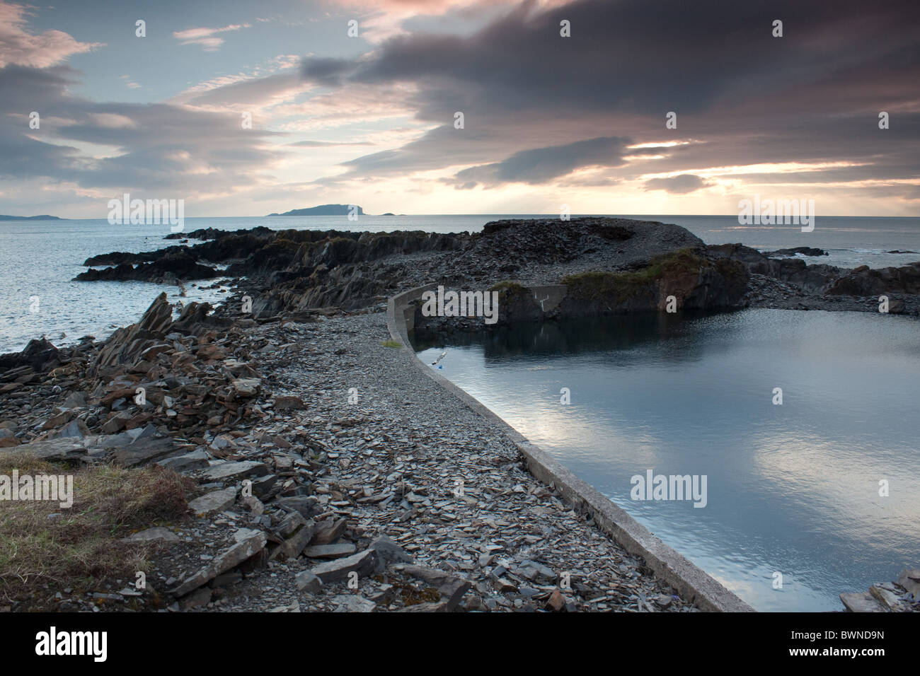 One of the old slate quarries at dusk on Easdale Island off the Argyll ...