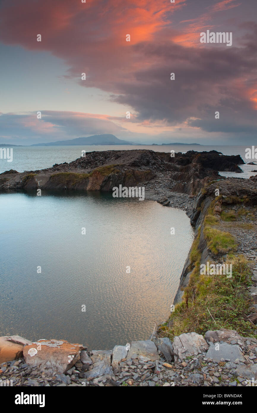 One of the old slate quarries at dusk on Easdale Island off the Argyll ...