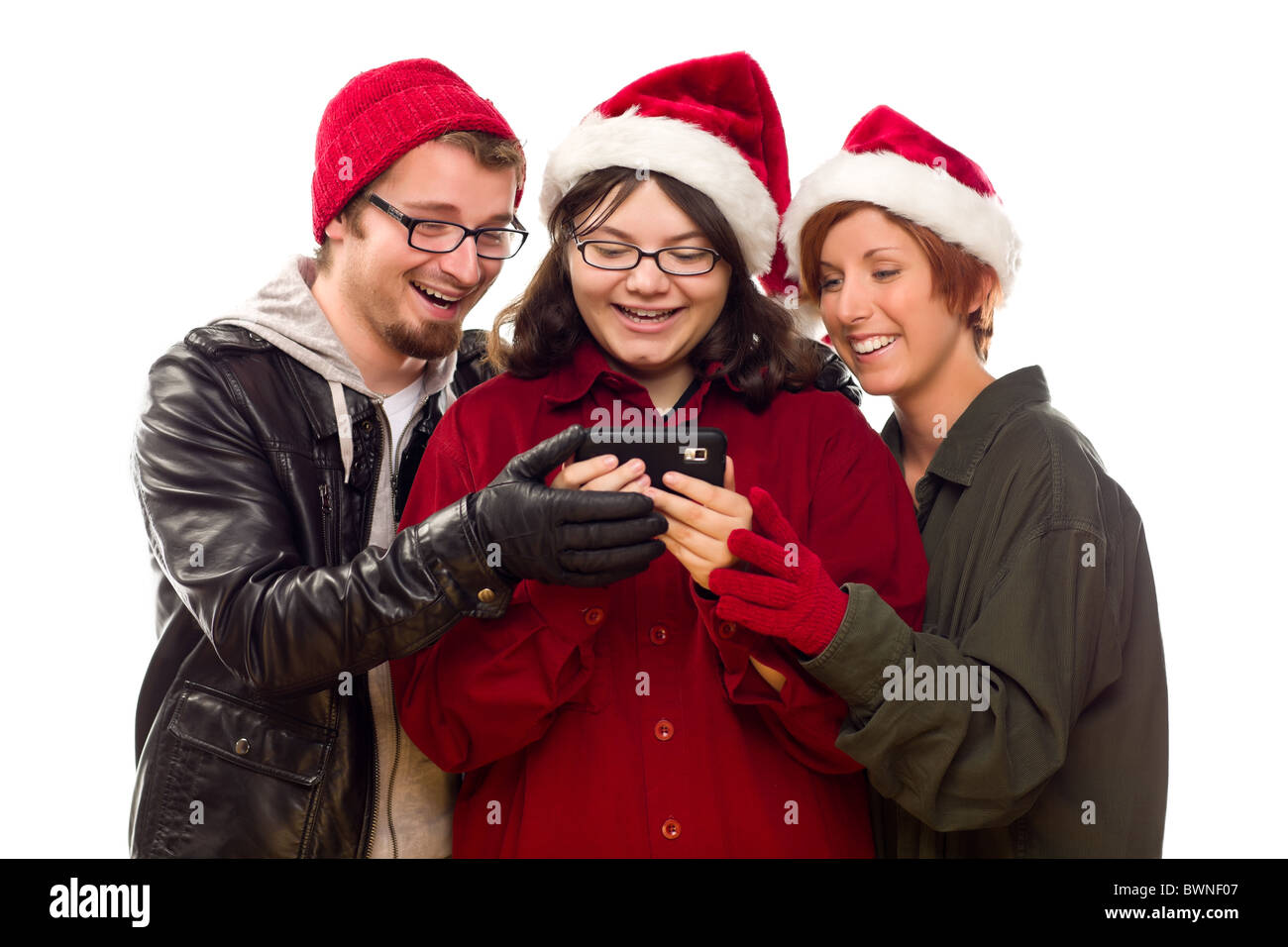 Three Friends Enjoying A Cell Phone Together Isolated on a White ...