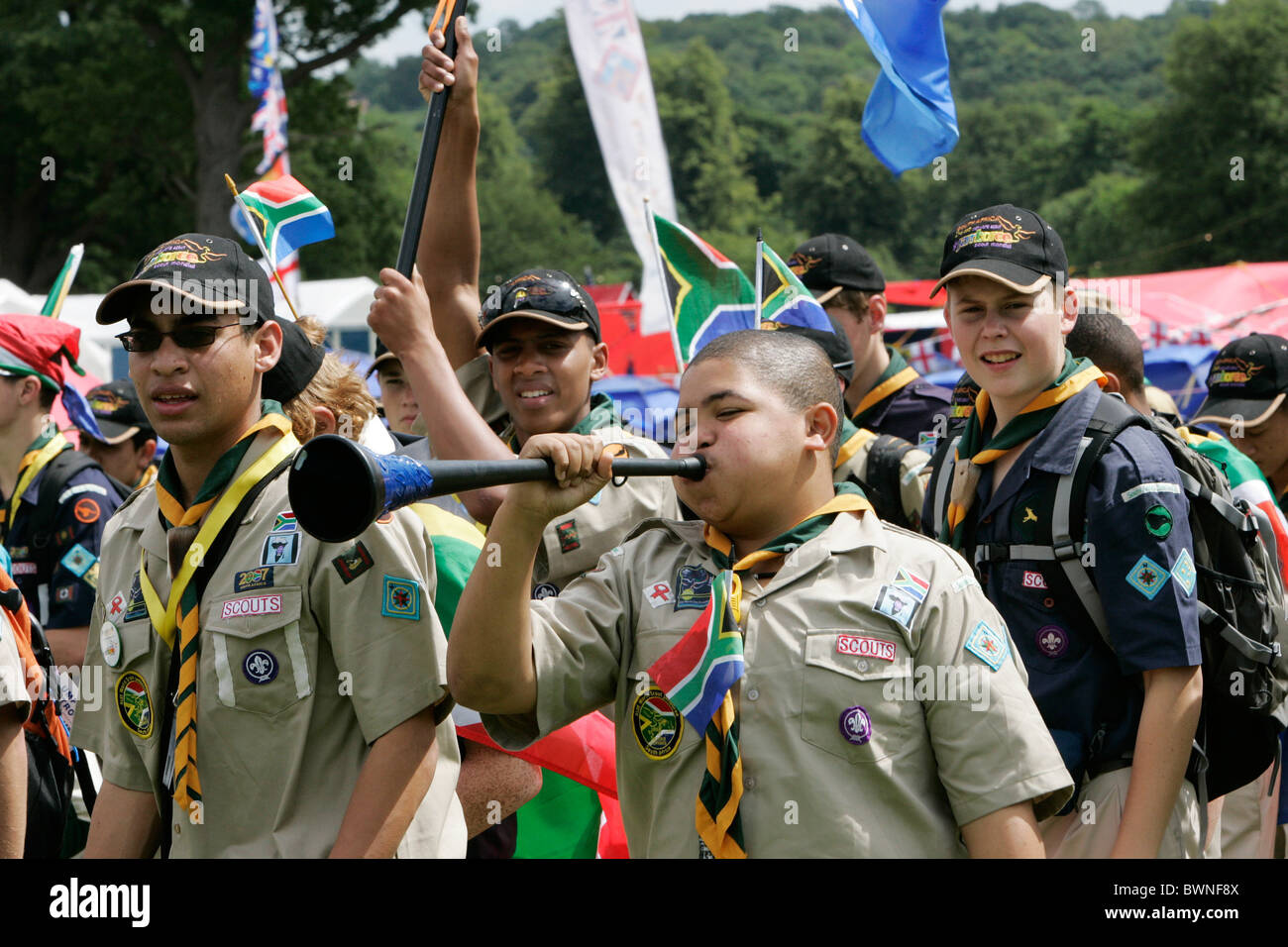 Scouts cheering and playing musical instruments as they attend the ...