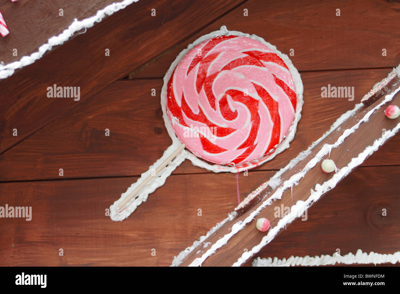sweets on a gingerbread house. A small children's garden house dressed ...