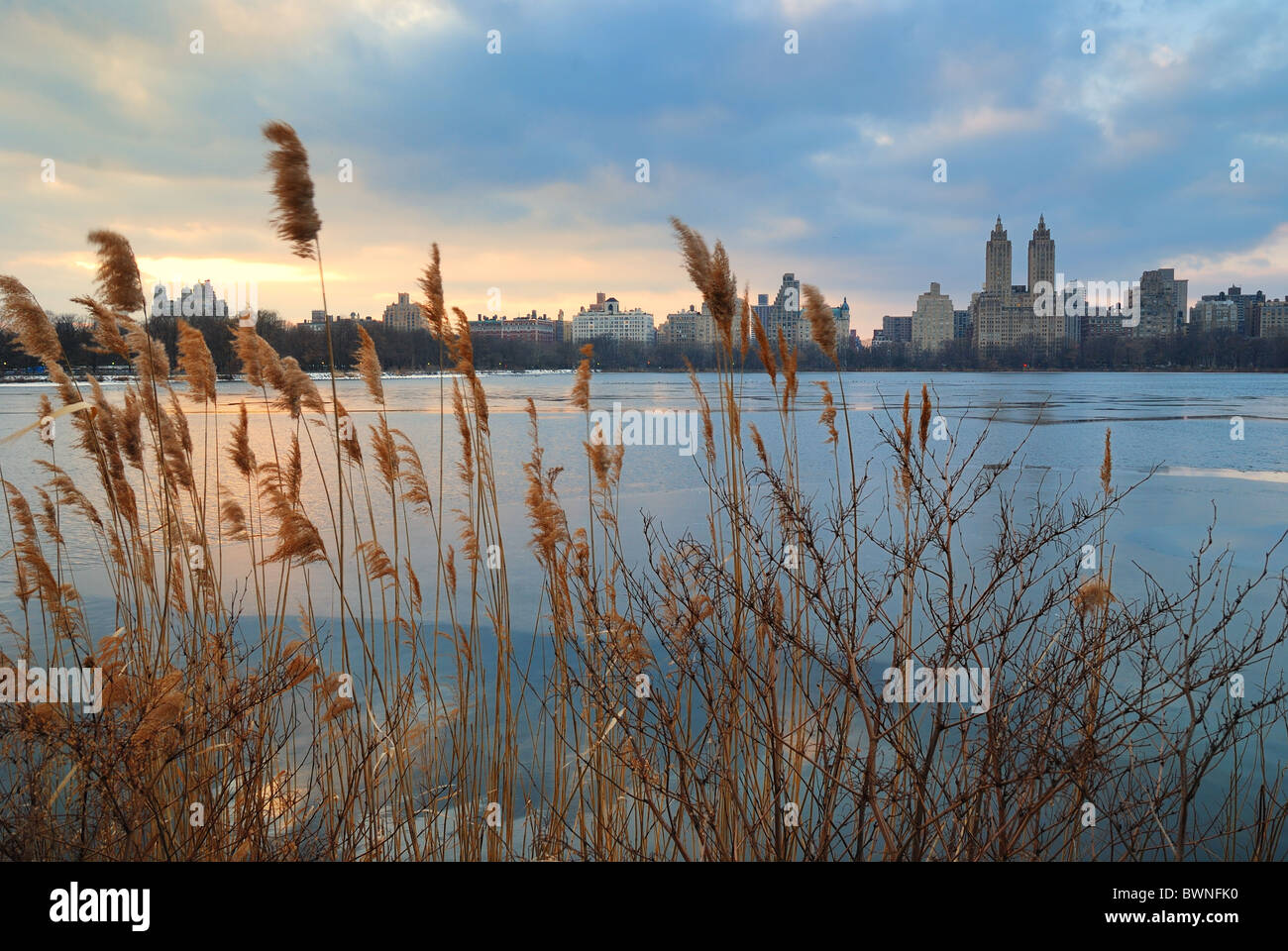 Central Park Sunset over icy lake, New York City Stock Photo - Alamy