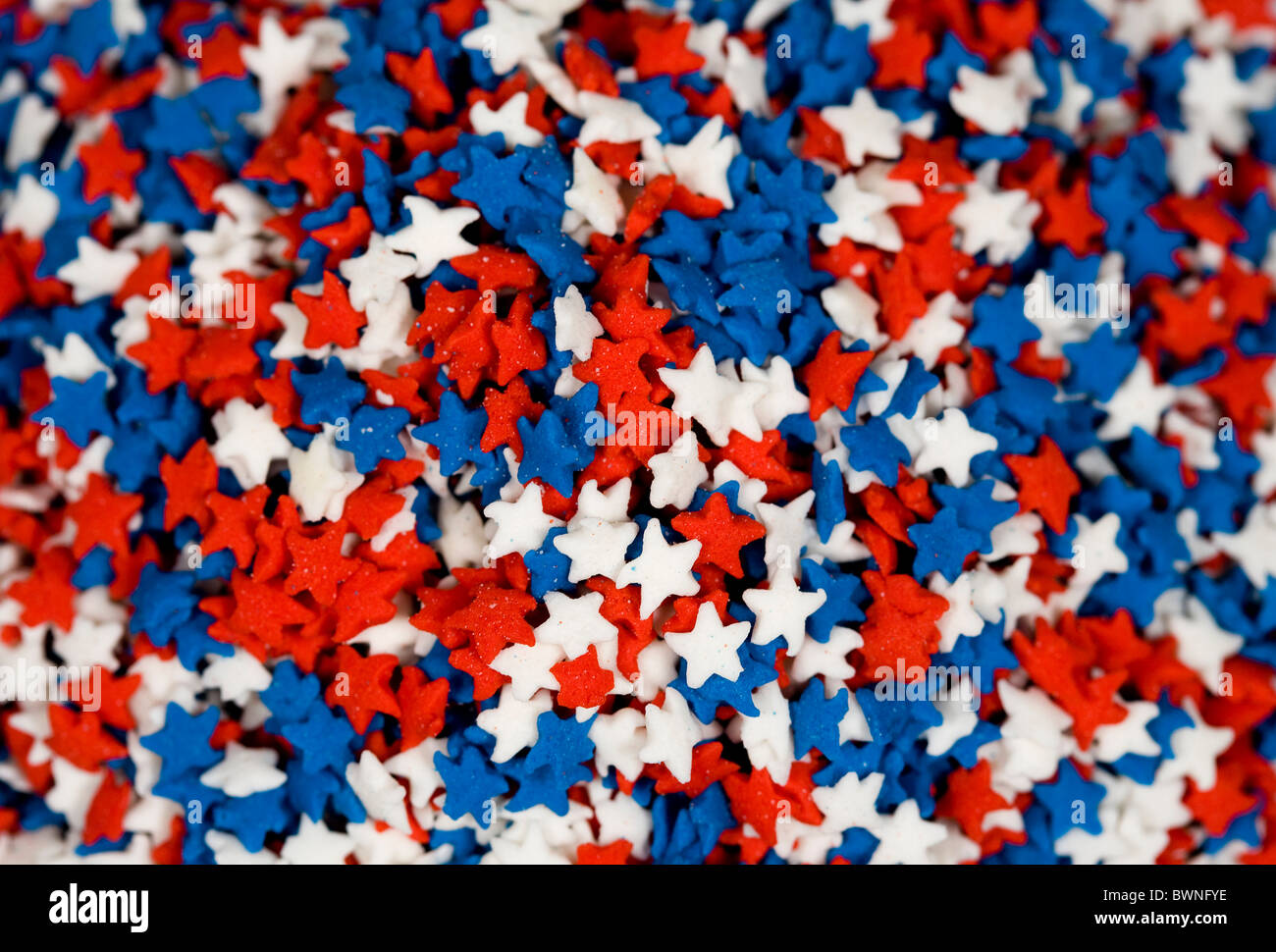 Star red, white and blue sprinkles Stock Photo - Alamy