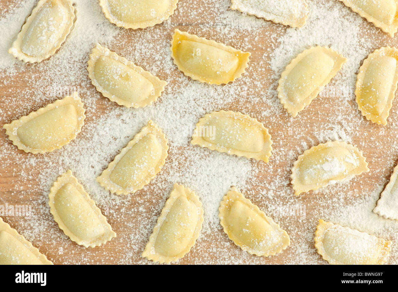 Uncooked ravioli pasta prepared and ready for cooking from above Stock ...