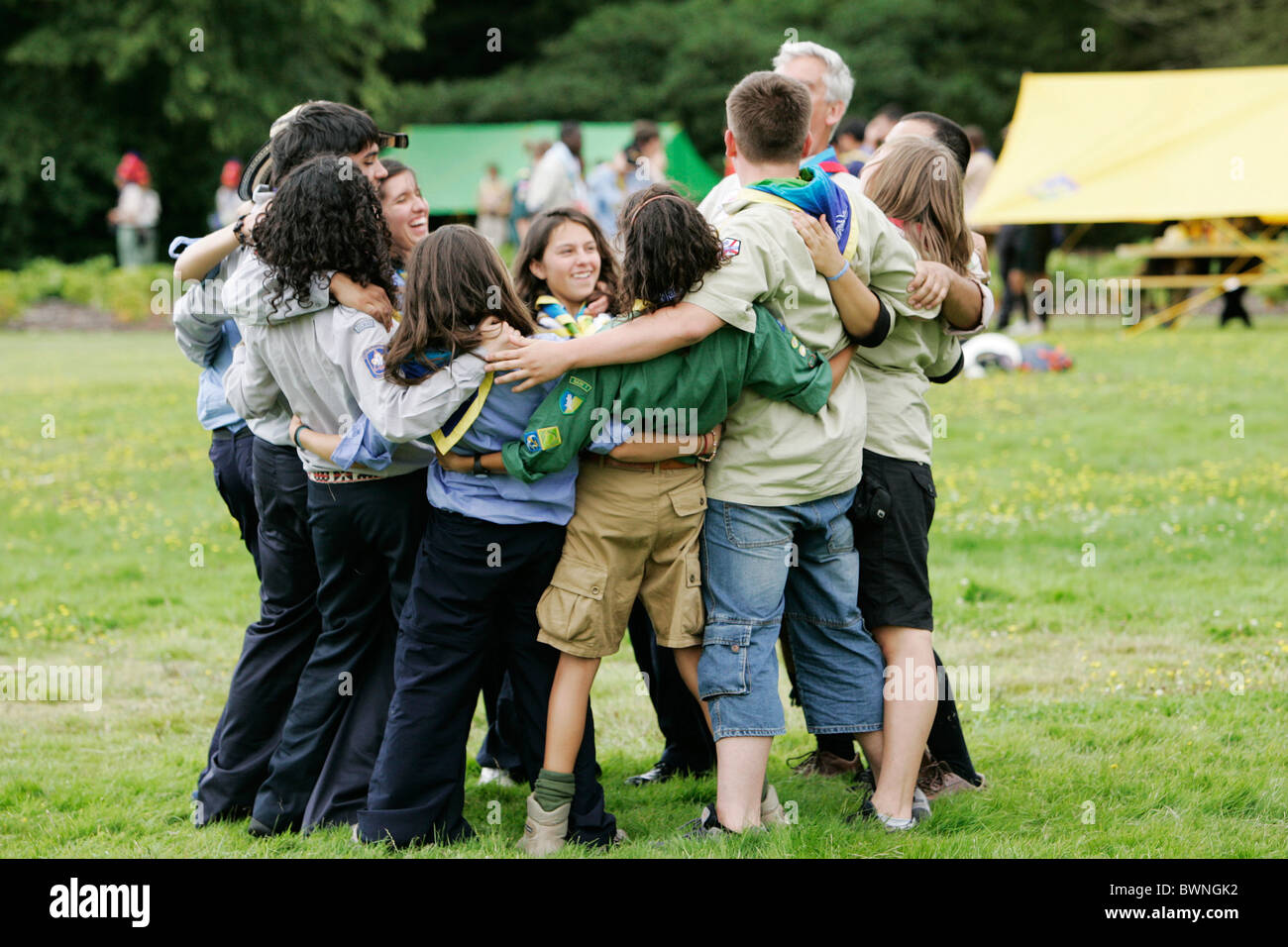 Scouts hugging in a group as they attend the opening of the 21st World ...