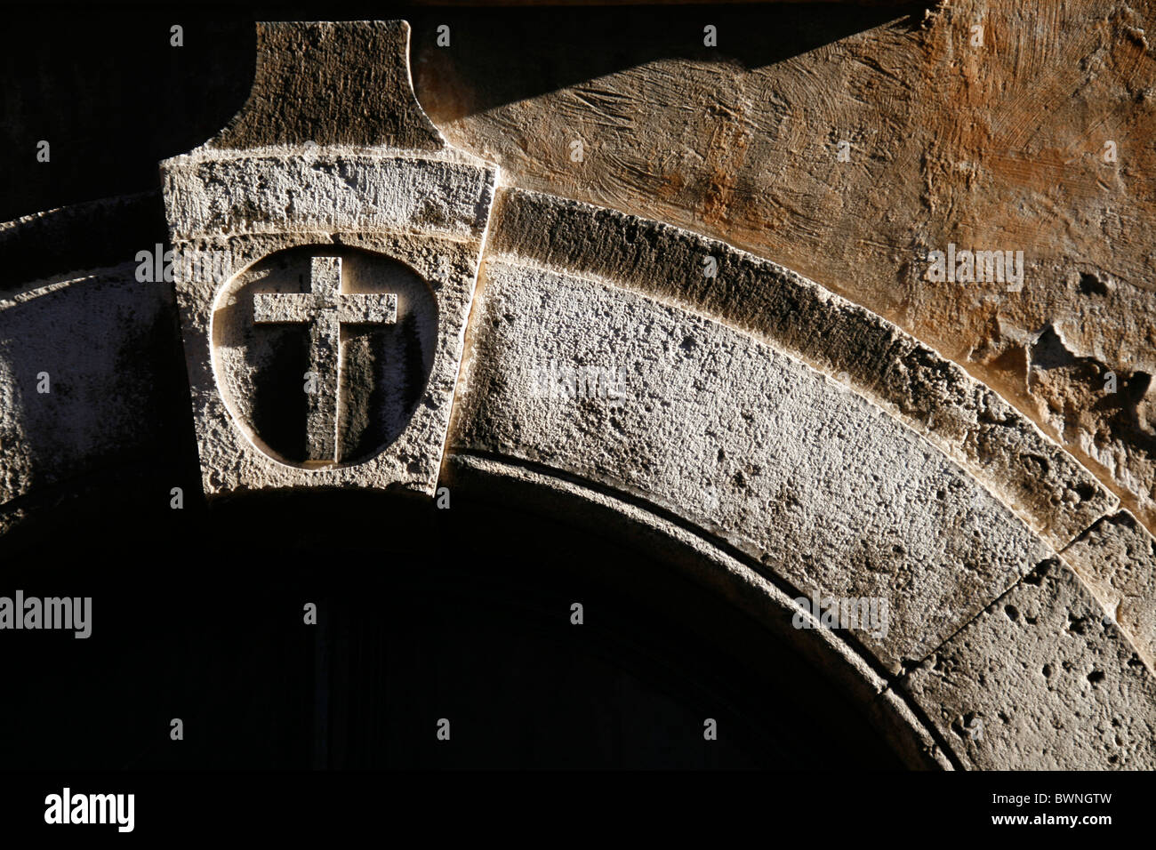 Cross by church entrance in rome hi-res stock photography and images ...