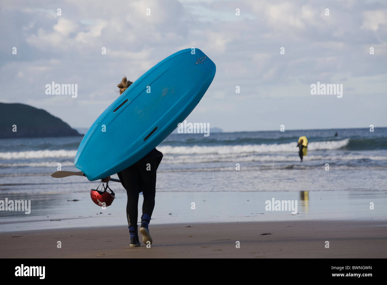 Surfer with board Stock Photo - Alamy