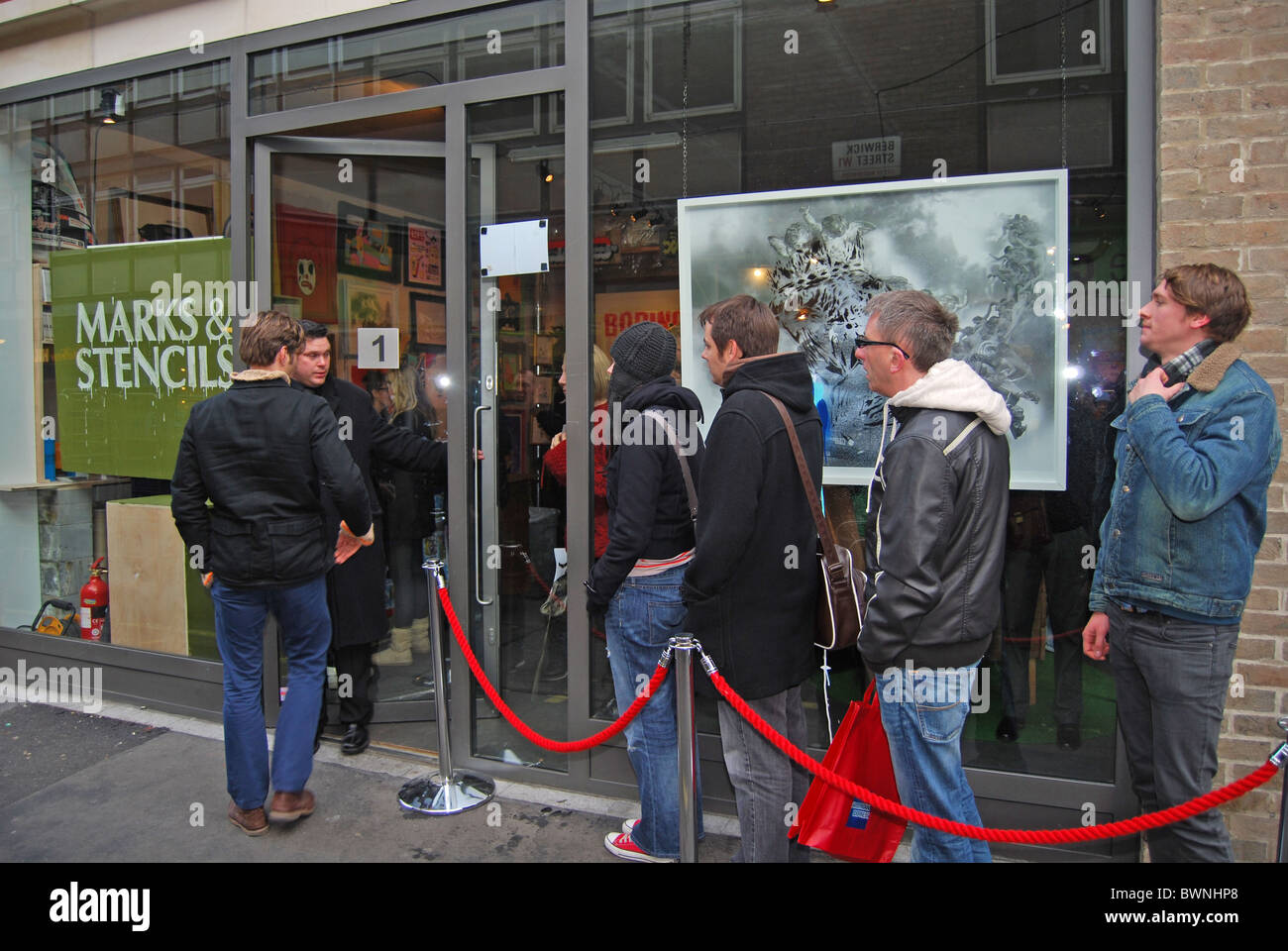 Banksy painting hi-res stock photography and images - Alamy