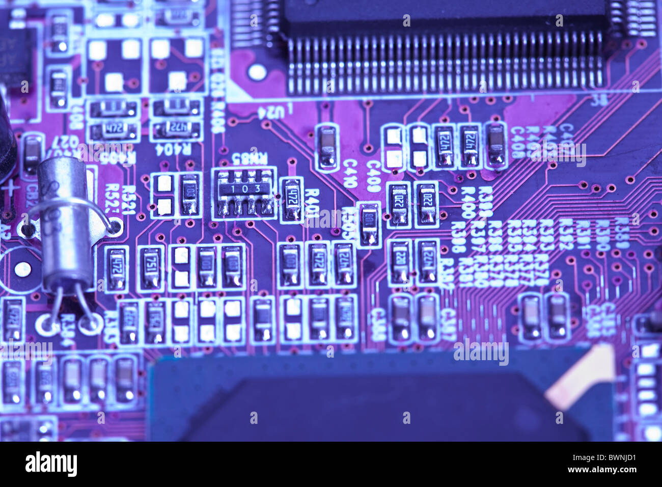 A close up shot of the backside of a computer circuit board, also known ...