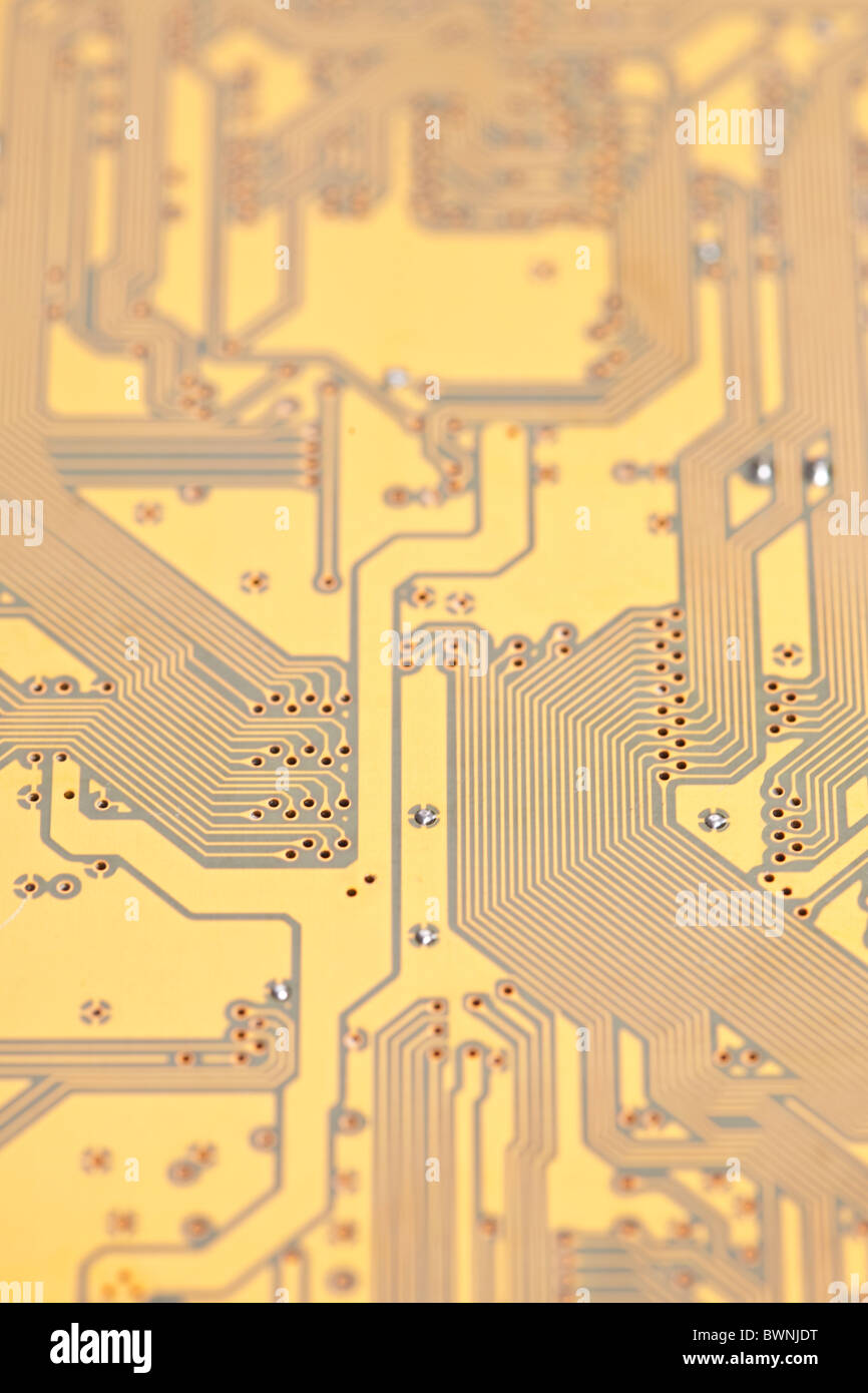 A close up shot of the backside of a computer circuit board, also known ...