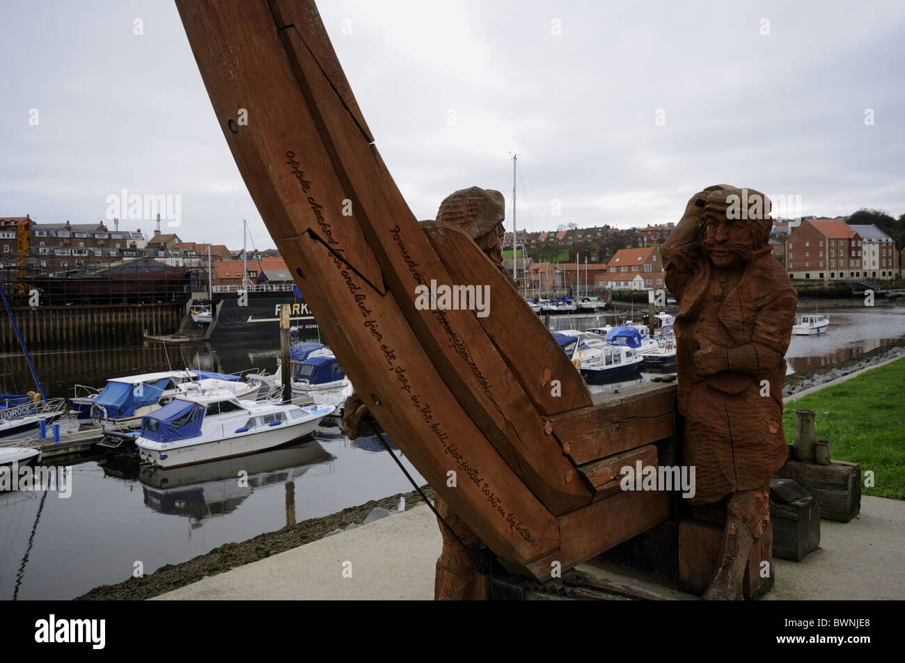 Carved Wooden Statue in front of Whitby Harbour in North Yorkshire ...