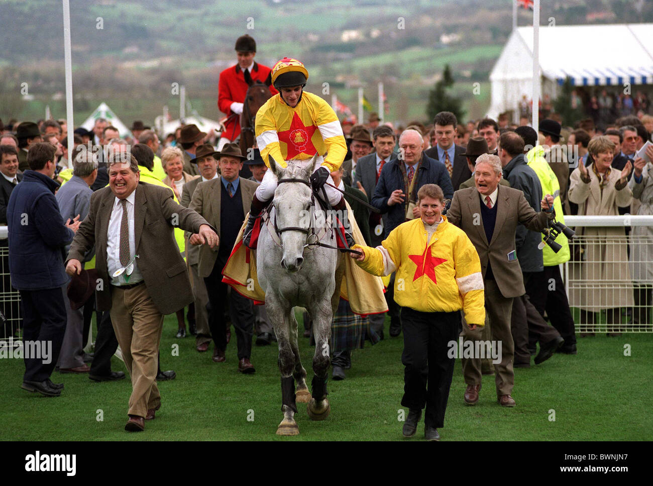 THE WINNER OF THE CHAMPION CHASE "ONE MAN" AND JOCKEY BRIAN HARDING AT ...