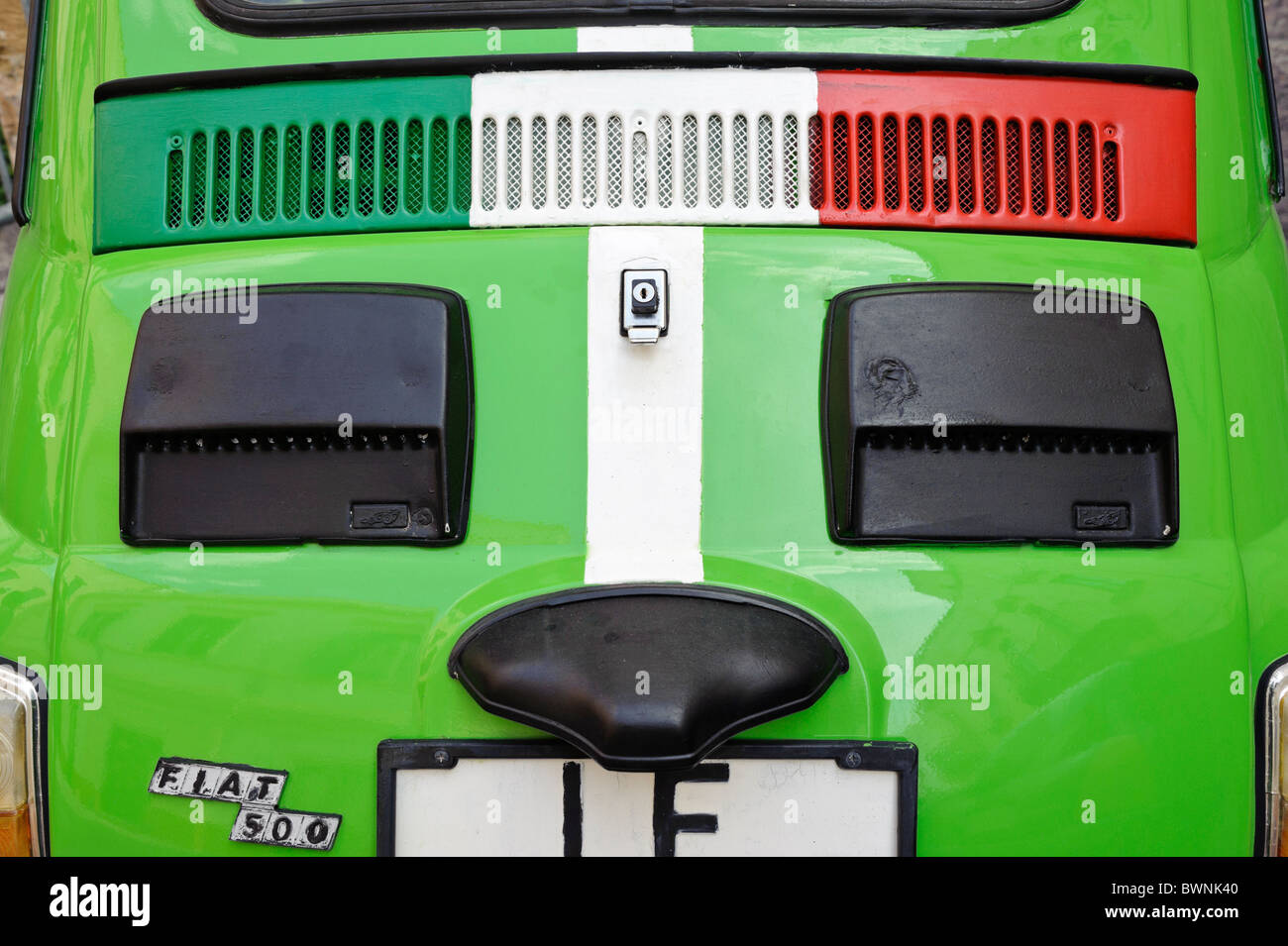 Back view of an original Fiat 500 painted in the national Italian ...