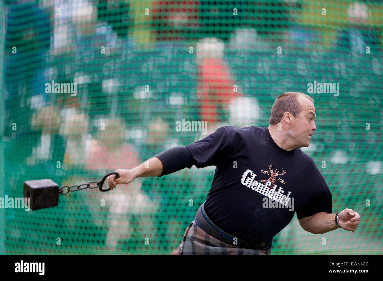 Test of strength Throwing the Hammer at the Braemar Games Highland ...