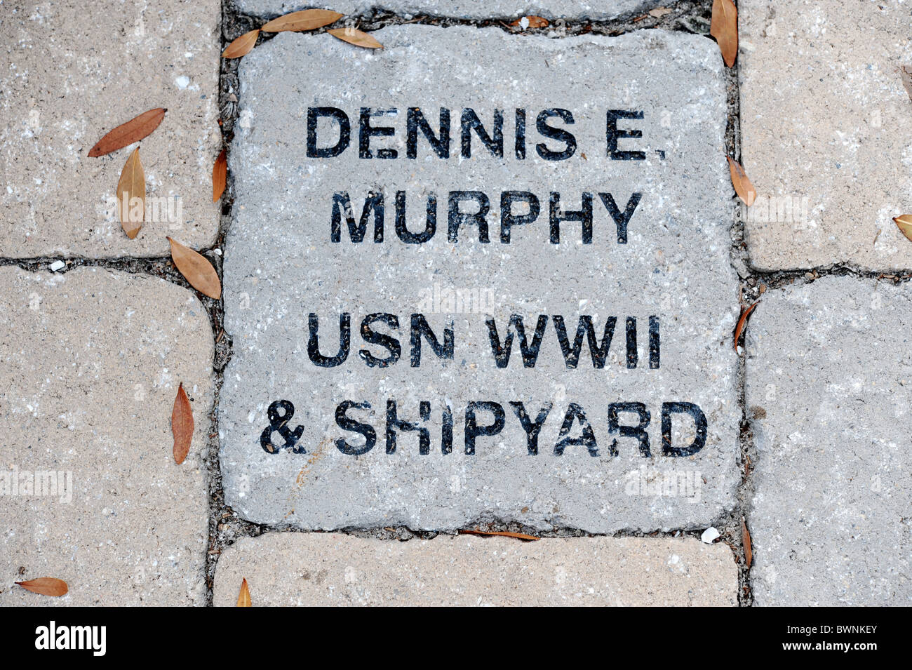 Inscribed stone at US Navy memorial on shore of Cooper river South ...