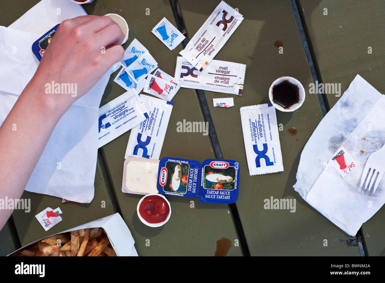 Messy picnic table covered in hi-res stock photography and images - Alamy