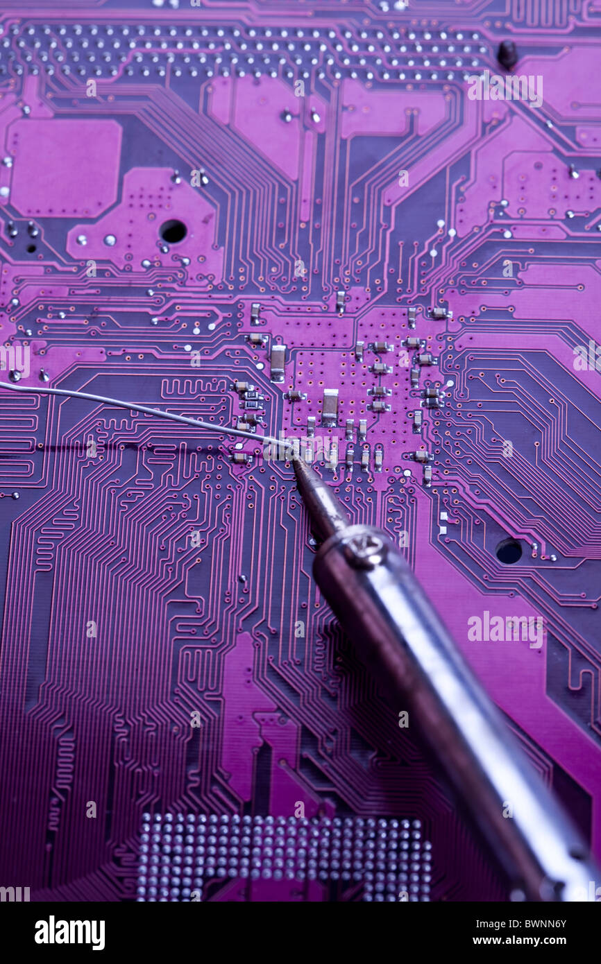 A close up shot of the backside of a computer circuit board, also known ...