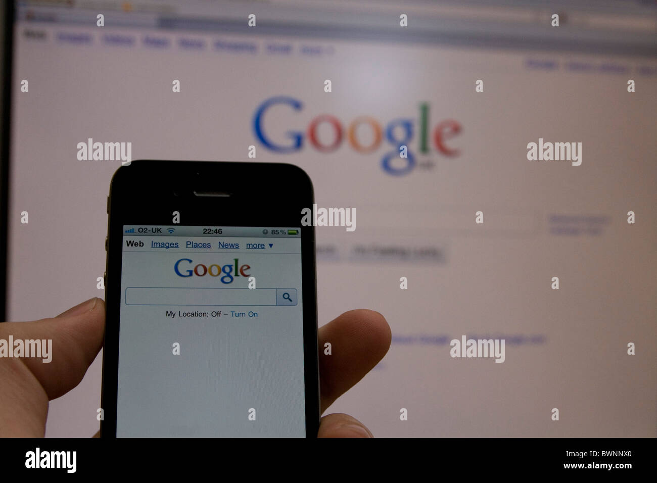 An Apple iPhone 4 mobile smart phone showing Google mobile with the ...