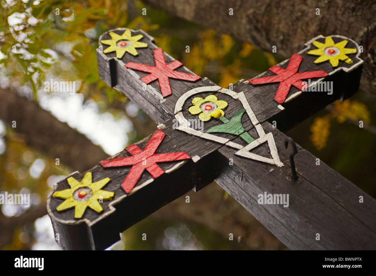 Colourful decorated wooden crosses at the Symbolic cemetary in the High ...