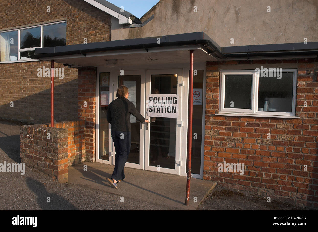Women entering Village Hall Polling Station during 2010 General ...