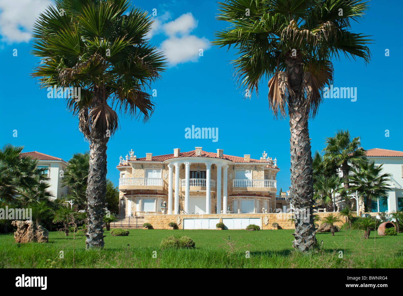 Huge beautiful house among the palms on the island of Cyprus, summer ...