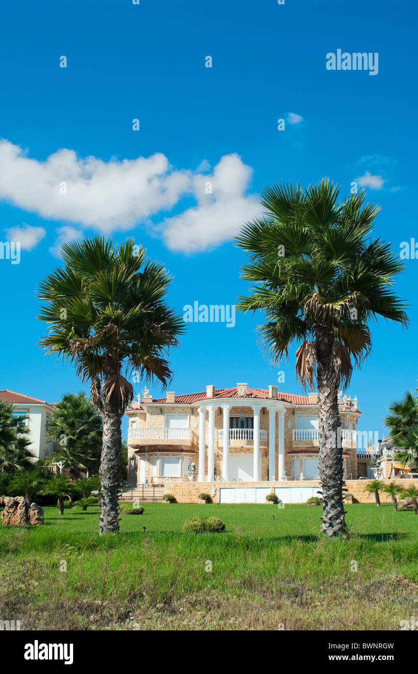 Huge beautiful house among the palms on the island of Cyprus, summer ...