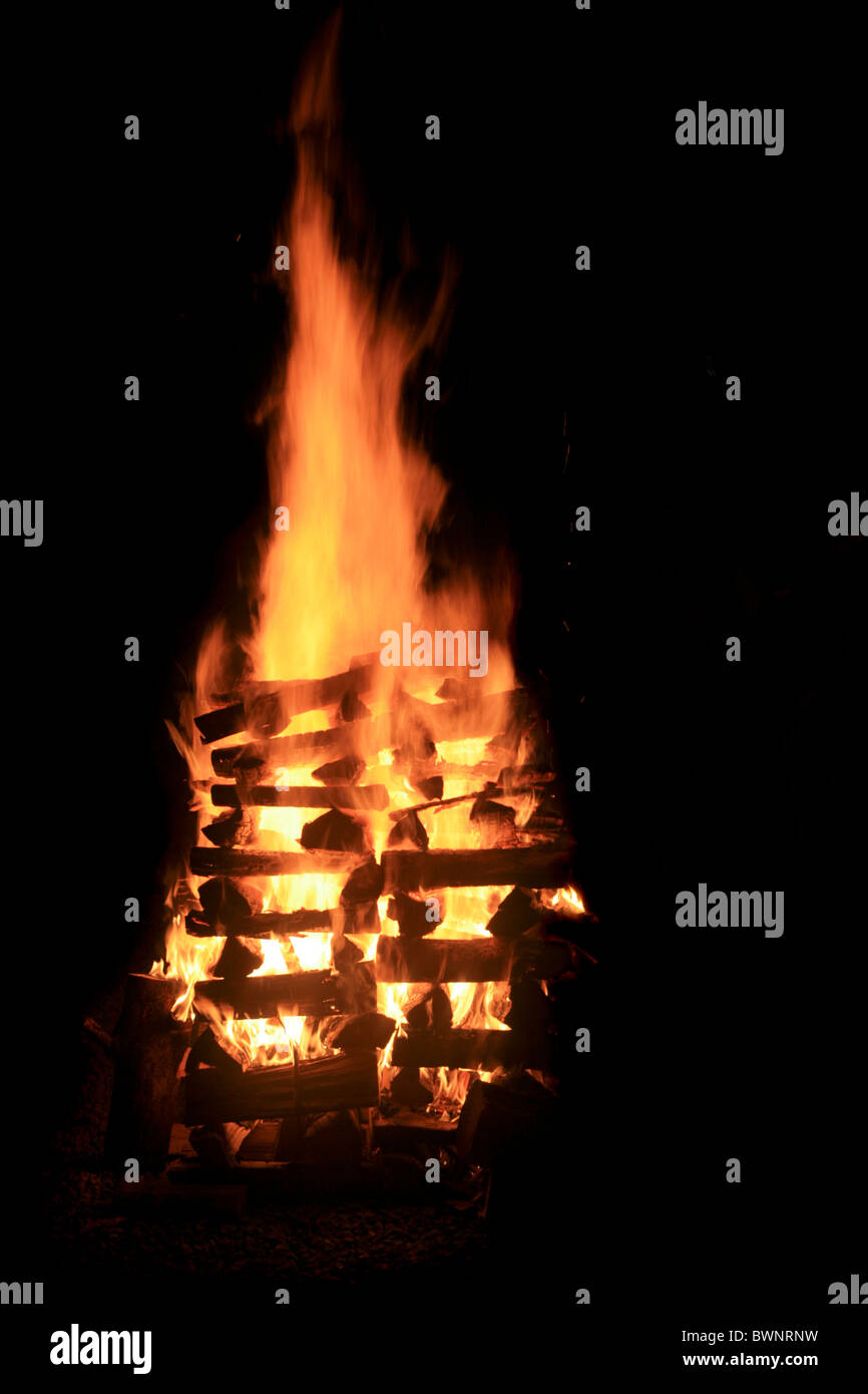 blazing bonfire at night with black background Stock Photo - Alamy