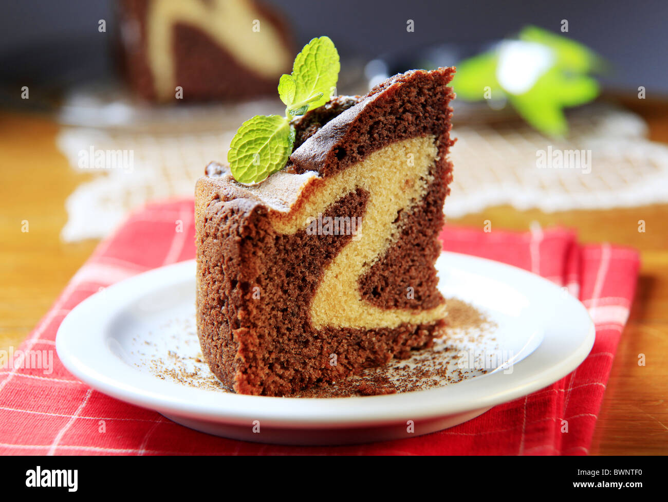 Slice of marble cake on a plate Stock Photo - Alamy