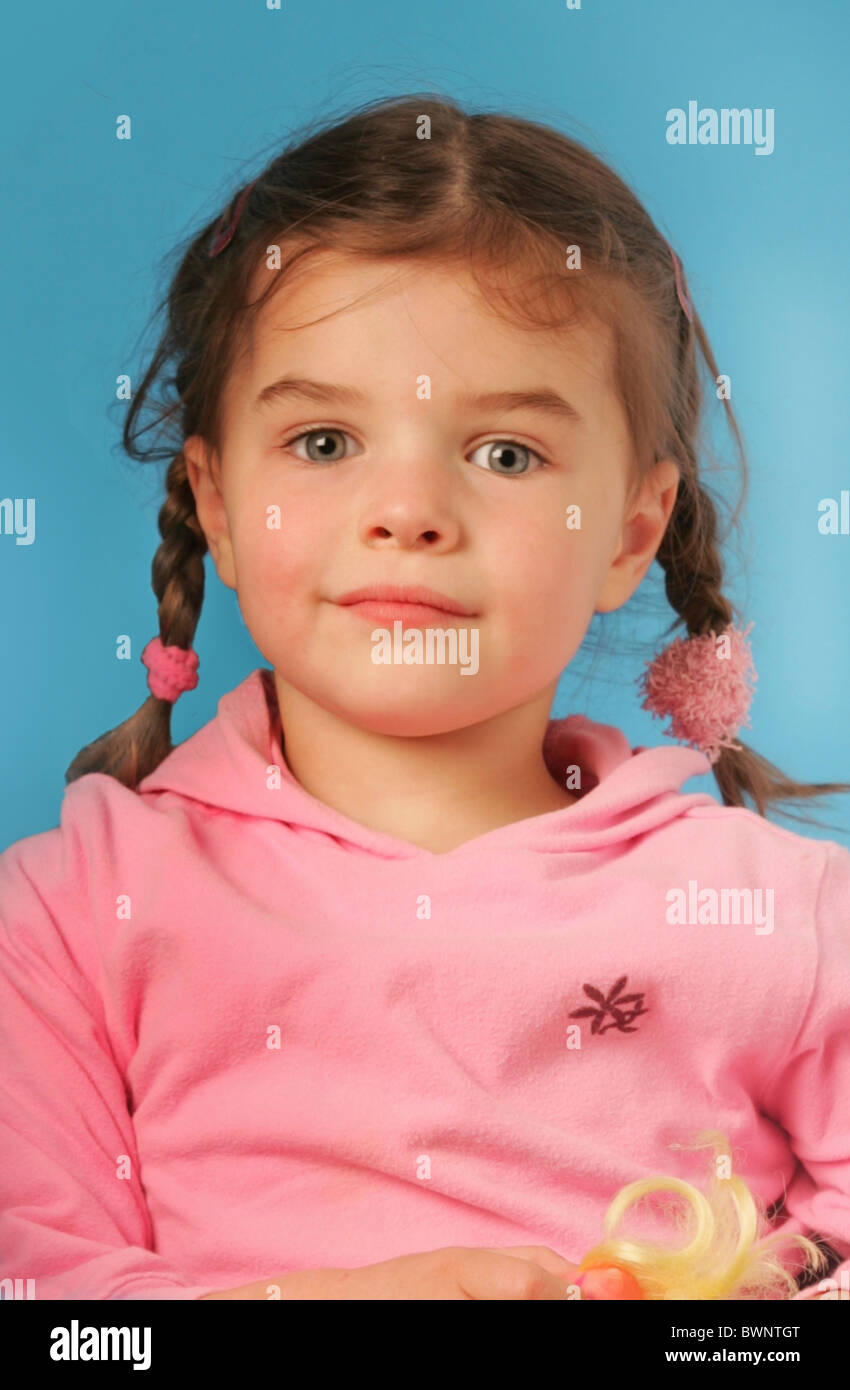 Toddler smiling pink and blue clothes hi-res stock photography and ...