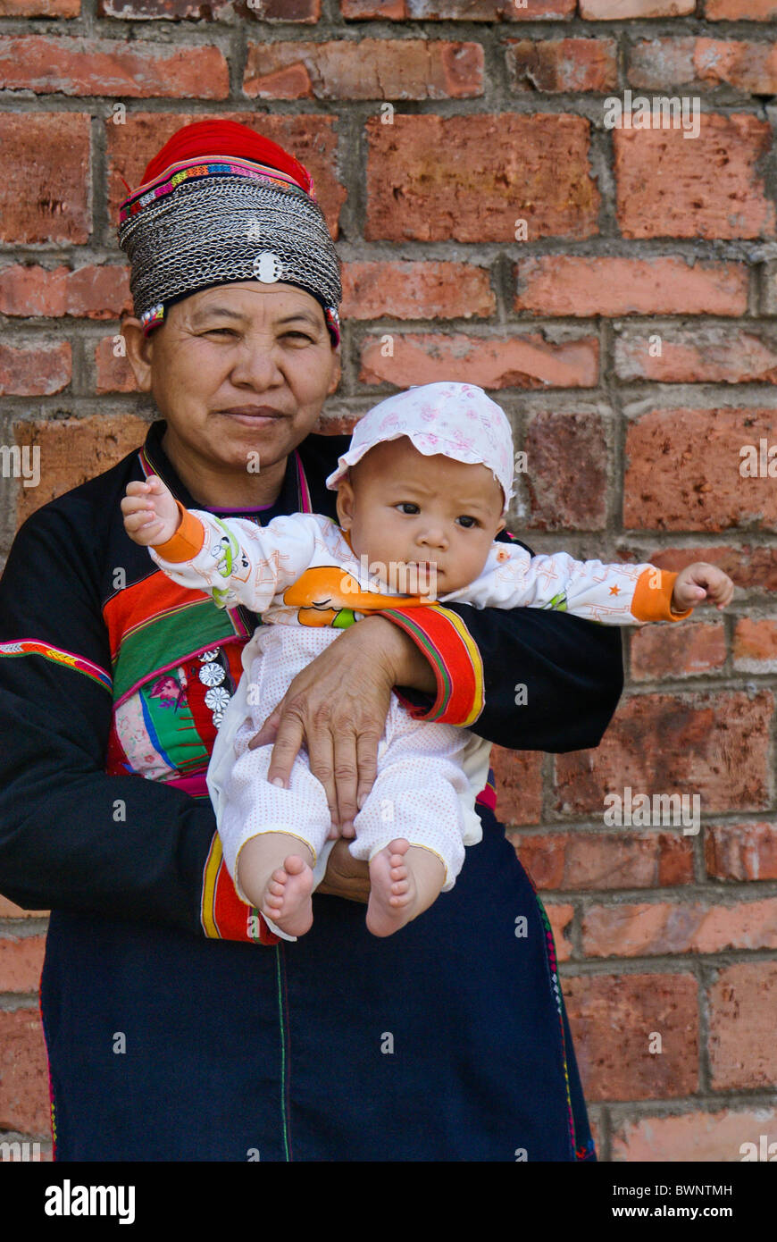 Flower Dai grandmother and baby, Xishuangbanna, Yunnan, China Stock ...