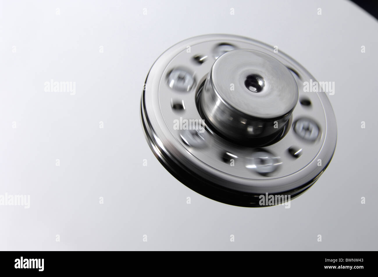 Hard disk drive rotating spindel Stock Photo - Alamy
