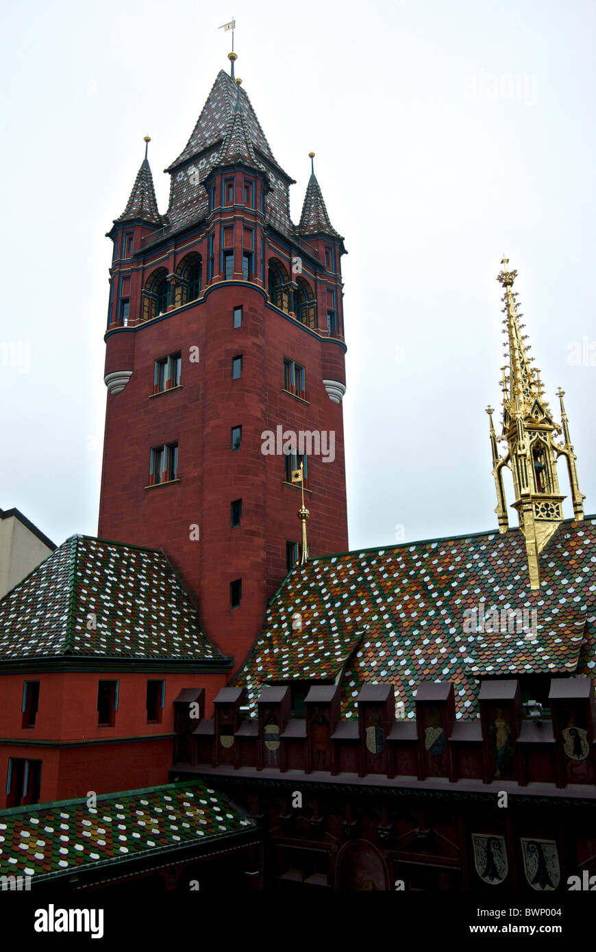 Historic Rathaus red city hall with gold bell tower and multi-colour ...