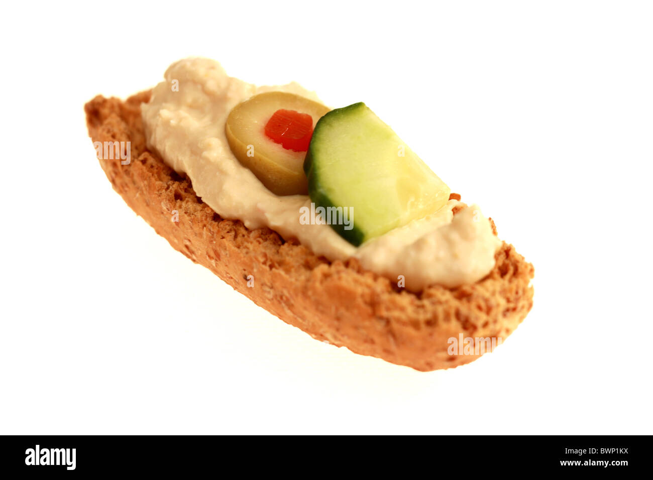 Wholegrain Krisproll with Houmous and Cucumber Stock Photo - Alamy